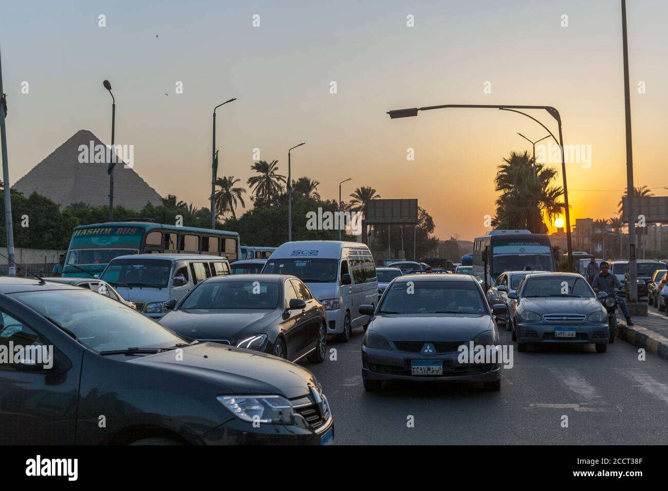 Traffic jam with Great Pyramid in background, Cairo Stock Photo - Alamy