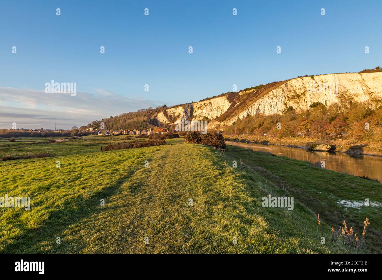 Winter late afternoon light reflecting on the chalk cliffs, in Lewes ...