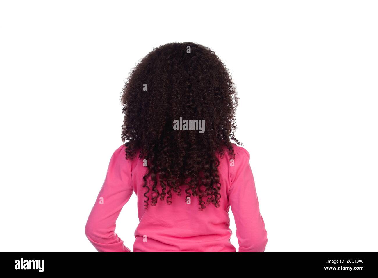 Back of a small girl with afro long hair isolated on a white background ...