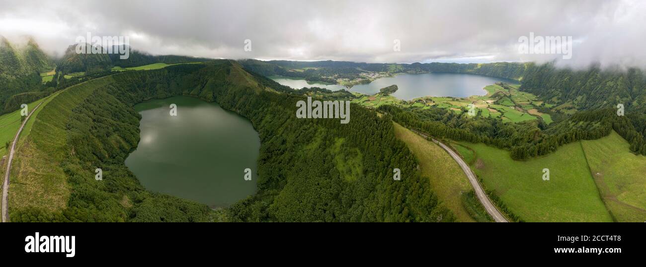 A panoramic aerial view of lakes of Sete Cidades from the Miradouro da ...