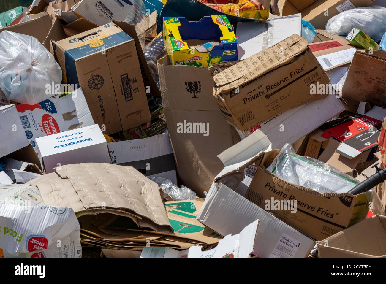 a pile of recycling and cardboard boxes waste rubbish ready for ...