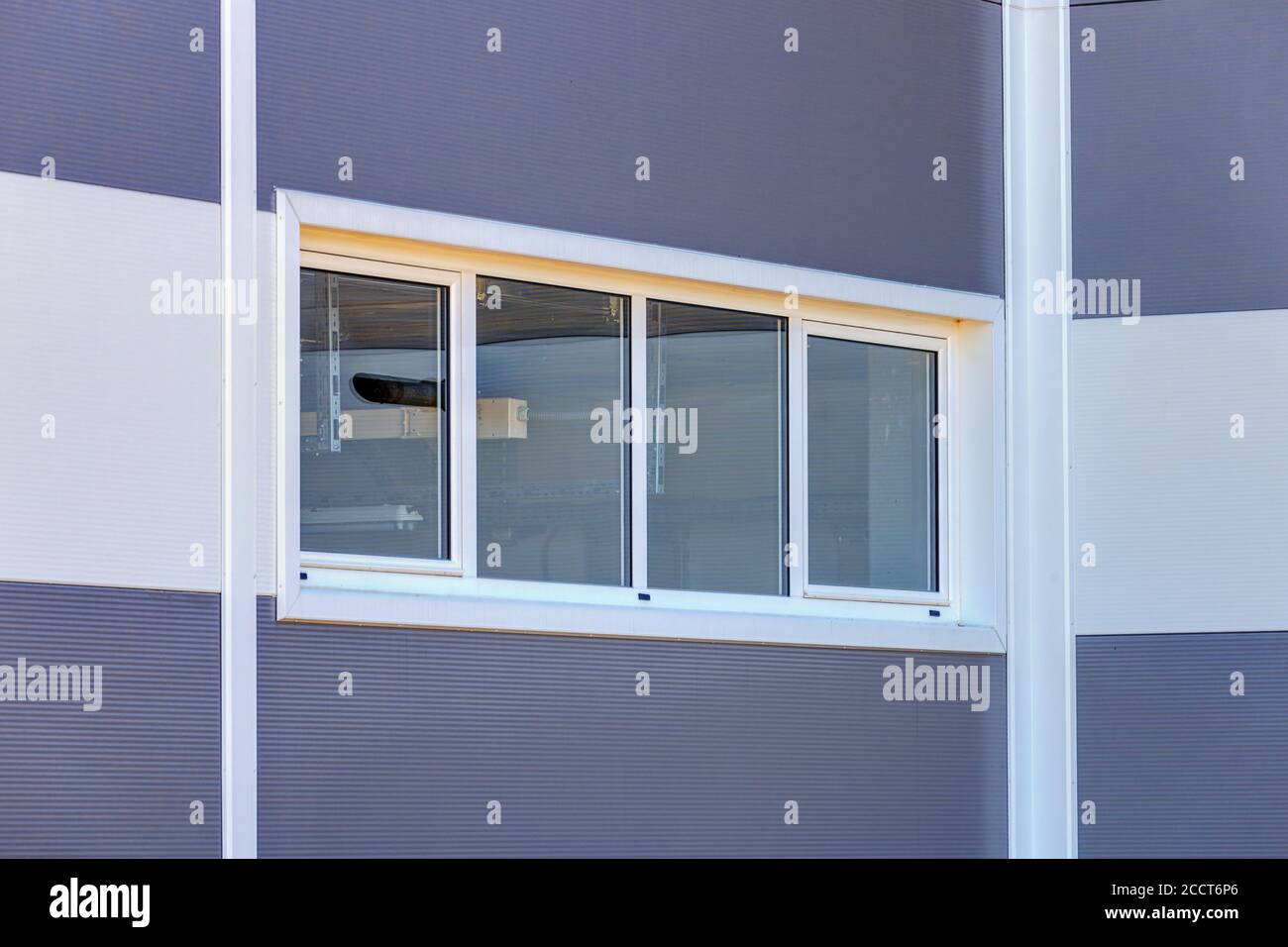 industrial building with blue windows Stock Photo - Alamy