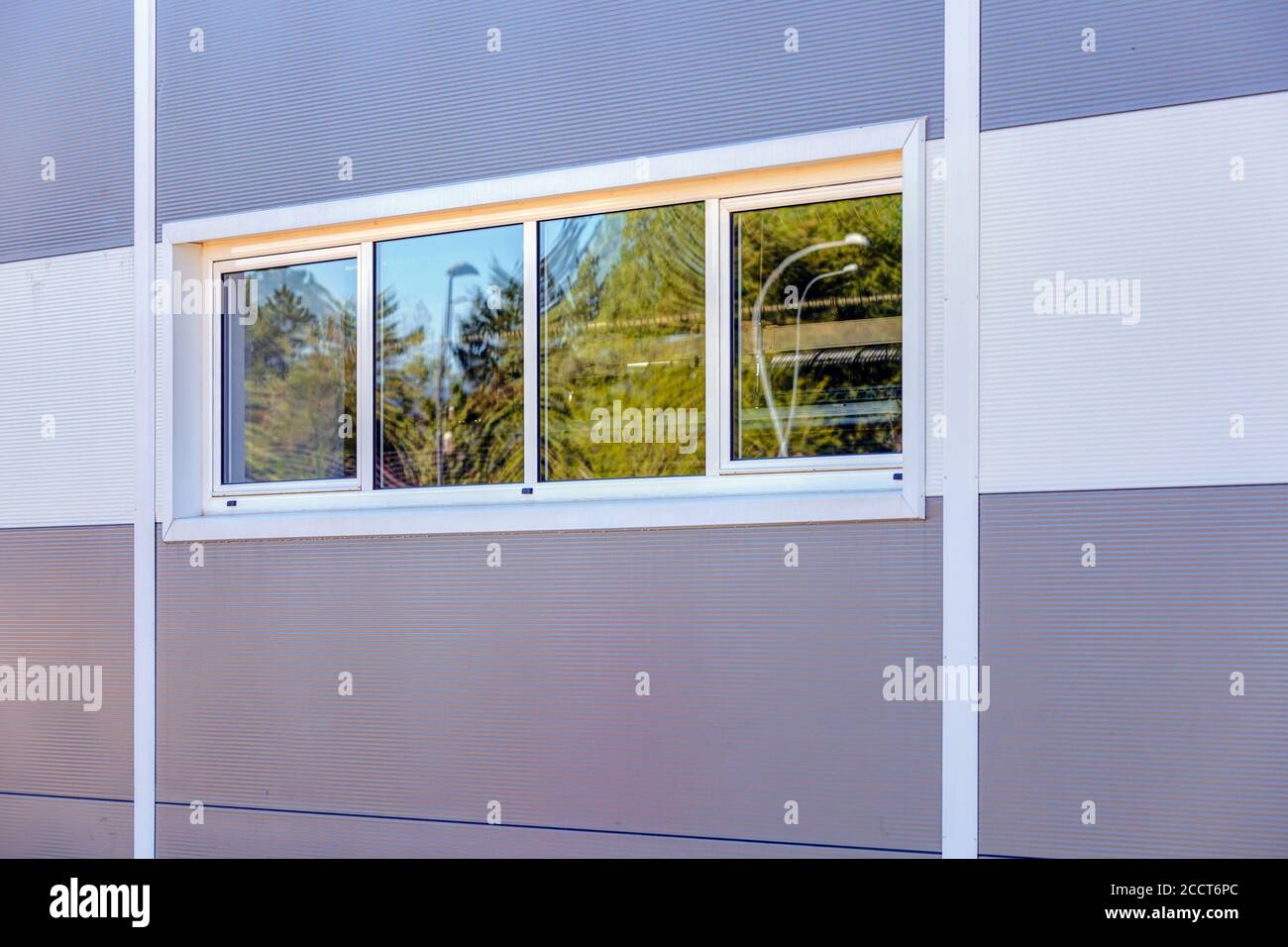 industrial building with blue windows Stock Photo - Alamy