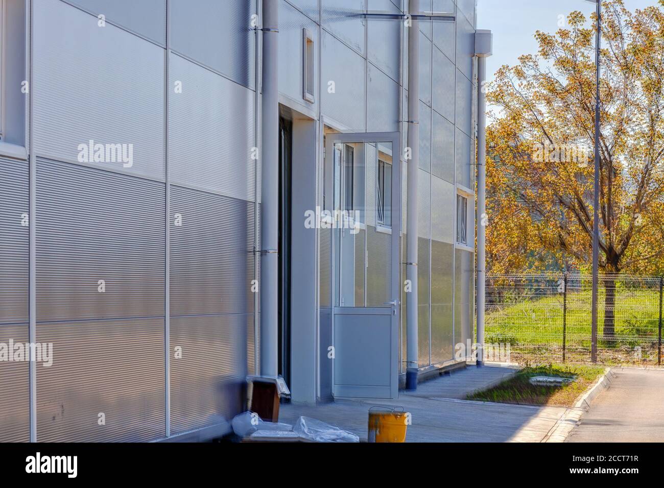 entrance for employees in the industrial hall Stock Photo - Alamy