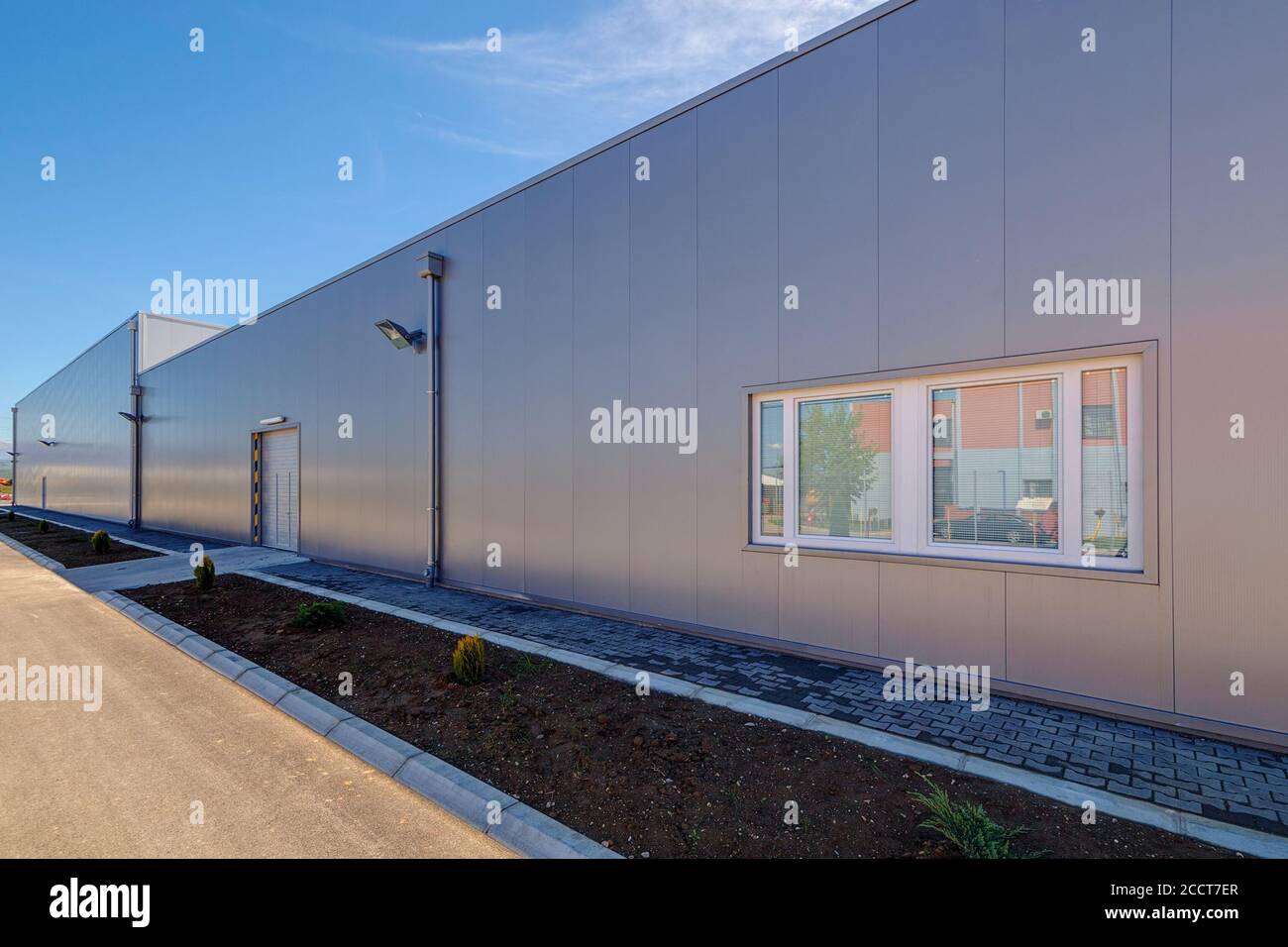 entrance for employees in the industrial hall Stock Photo - Alamy