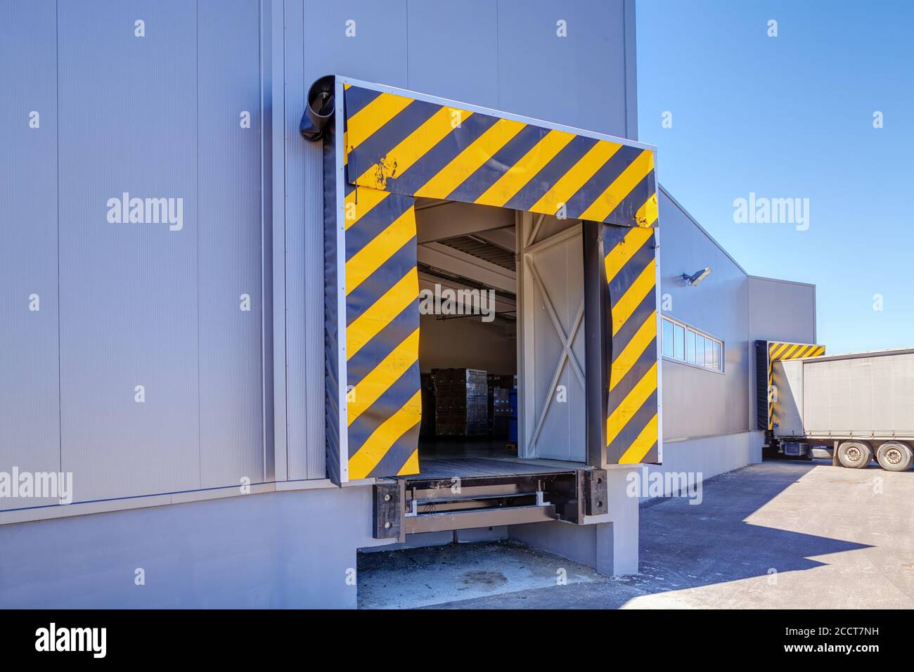 doors for loading cargo from the truck into the building Stock Photo ...