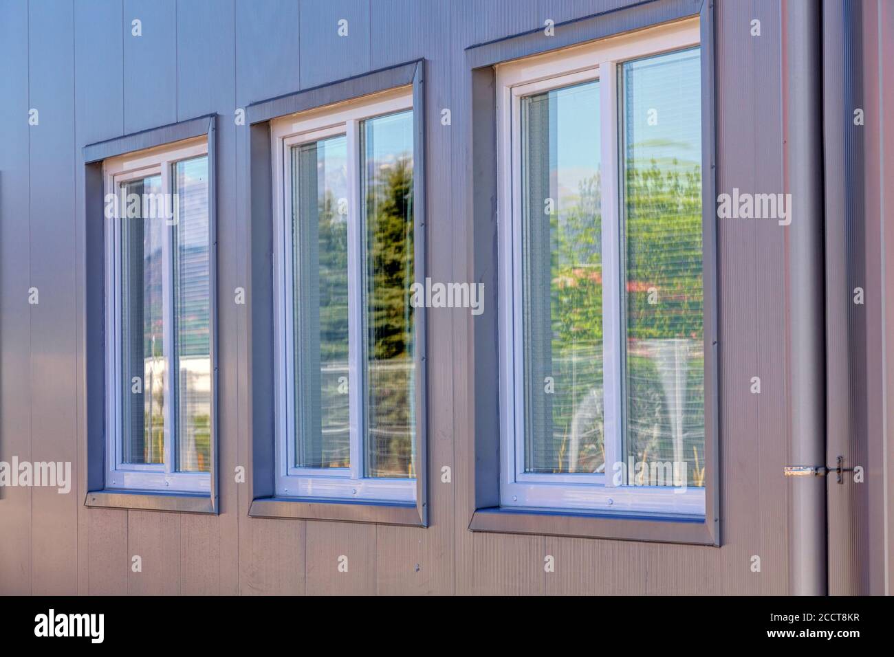 windows on the industrial business building Stock Photo - Alamy