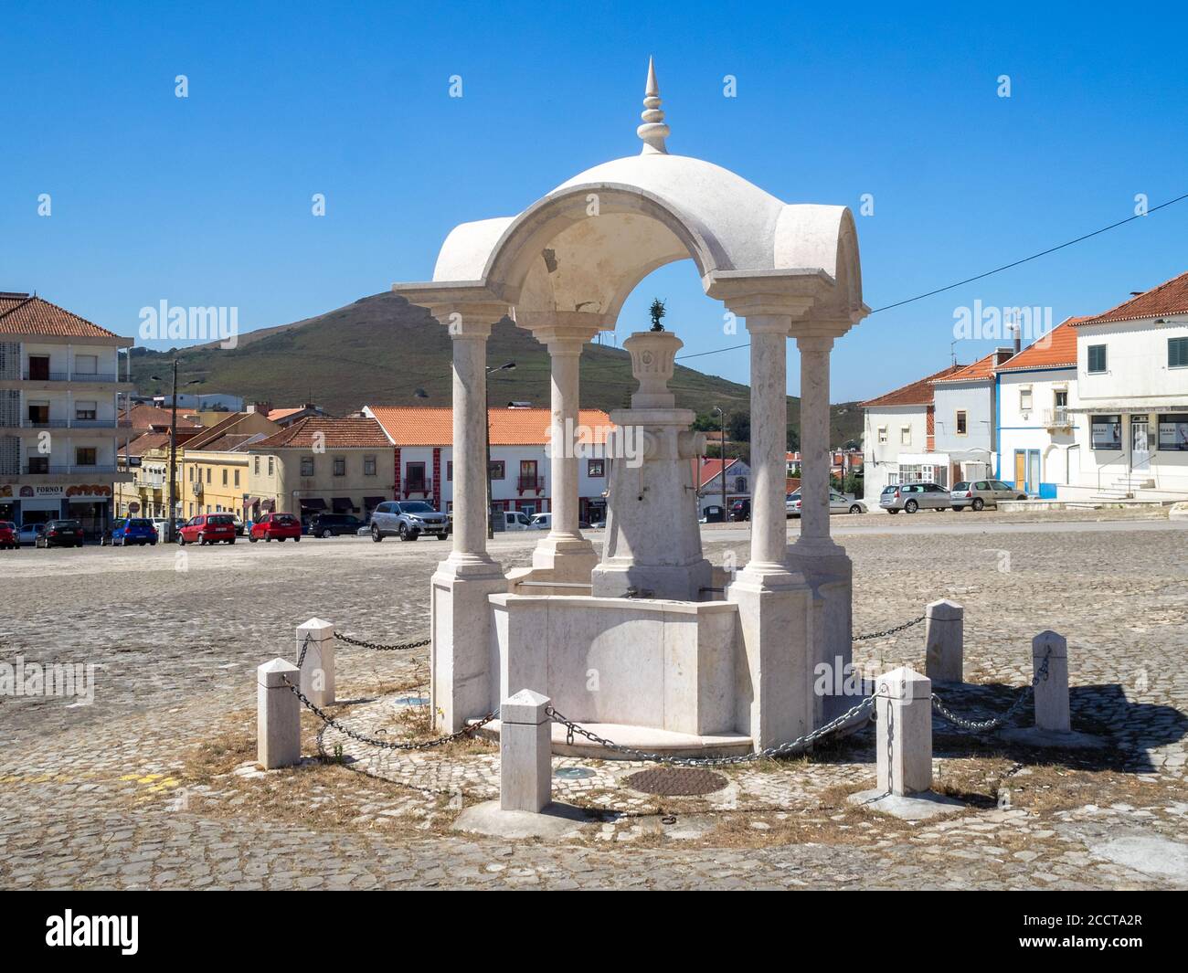 Old fountain in Malveira market square Stock Photo - Alamy