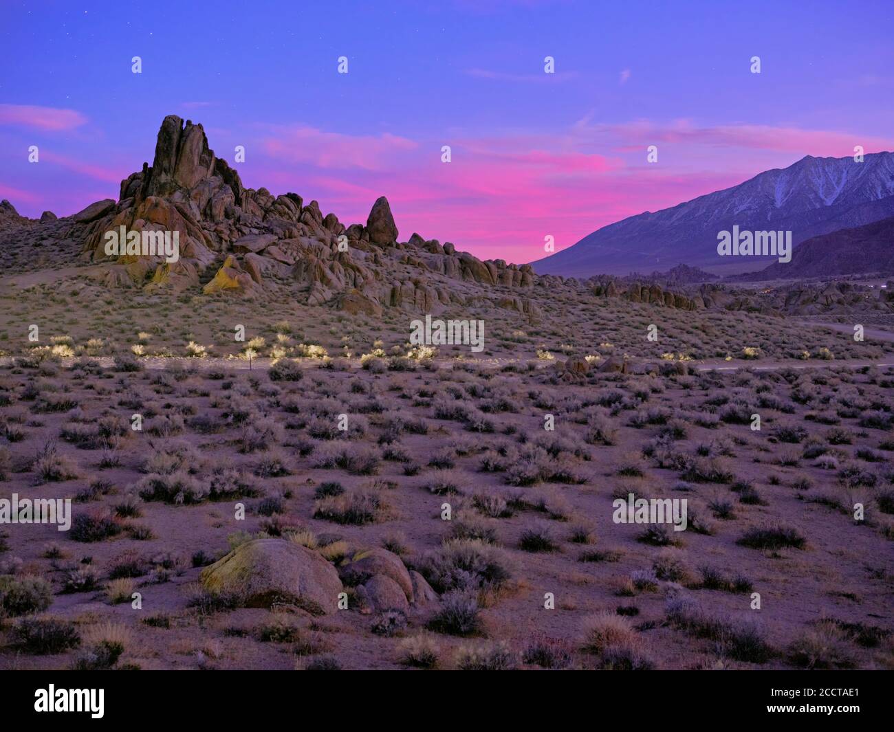 Sunset in the Alabama Hills, cotton candy clouds, rock formations Stock ...