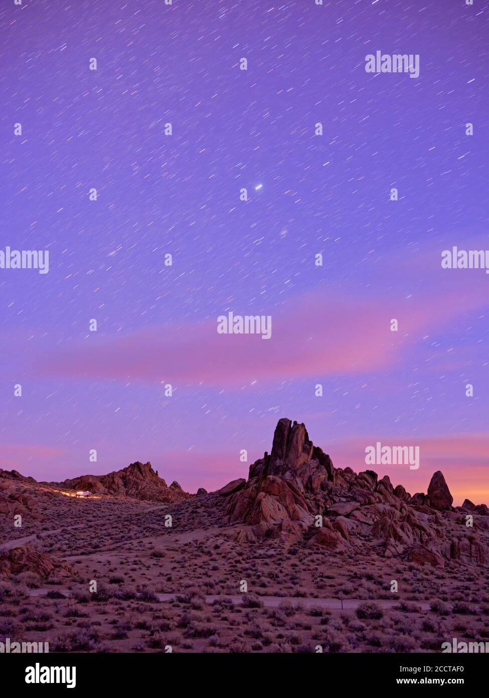 Campers on a ridge, star trails in the sky, Alabama Hills Stock Photo ...