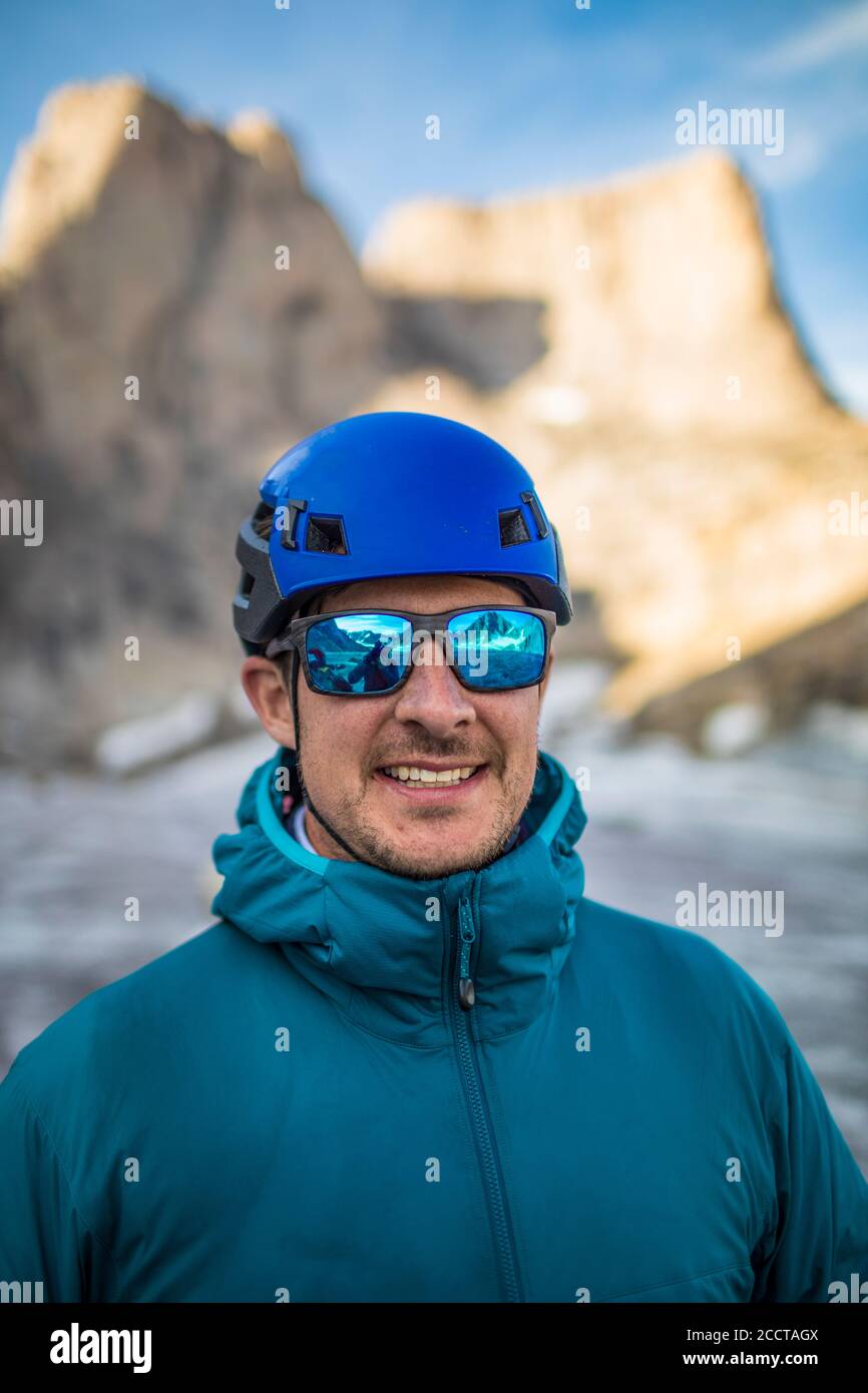 Portrait of climber wearing blue Stock Photo - Alamy