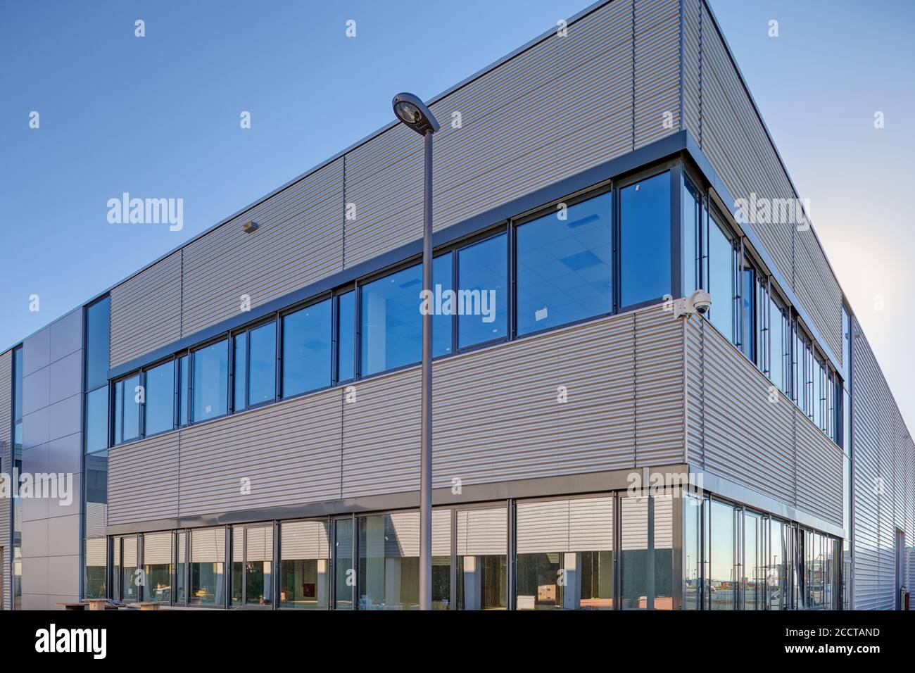 finishing work on building business industrial building Stock Photo - Alamy