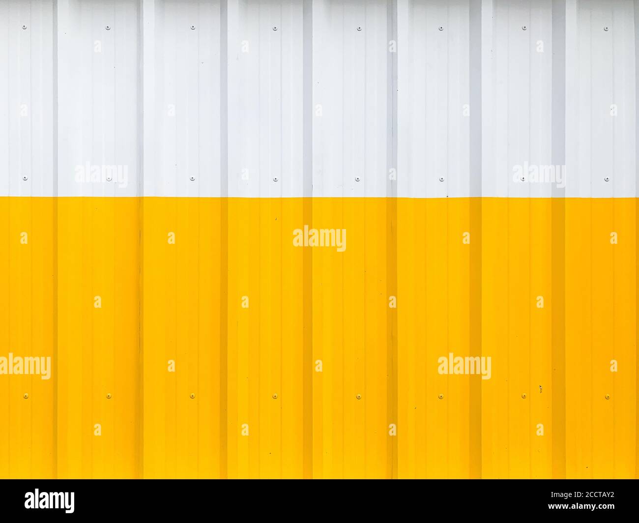 Colourful white and yellow wall background Stock Photo - Alamy