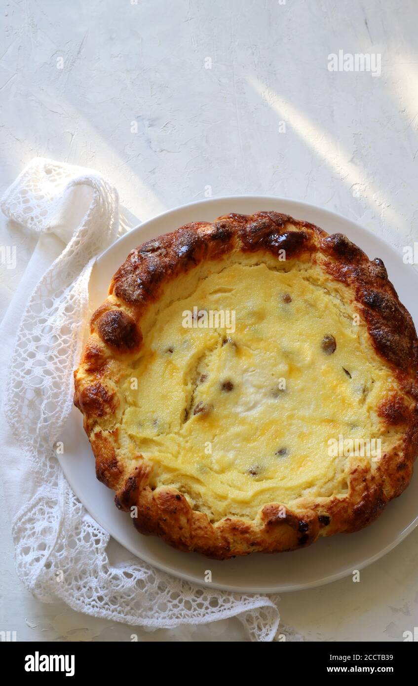 Top view of traditional romanian Easter cake with cheese - Pasca, white ...