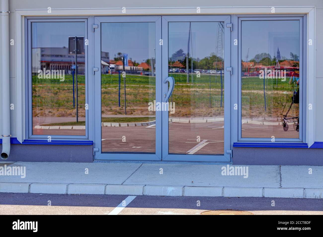entrance for employees in the industrial hall Stock Photo - Alamy