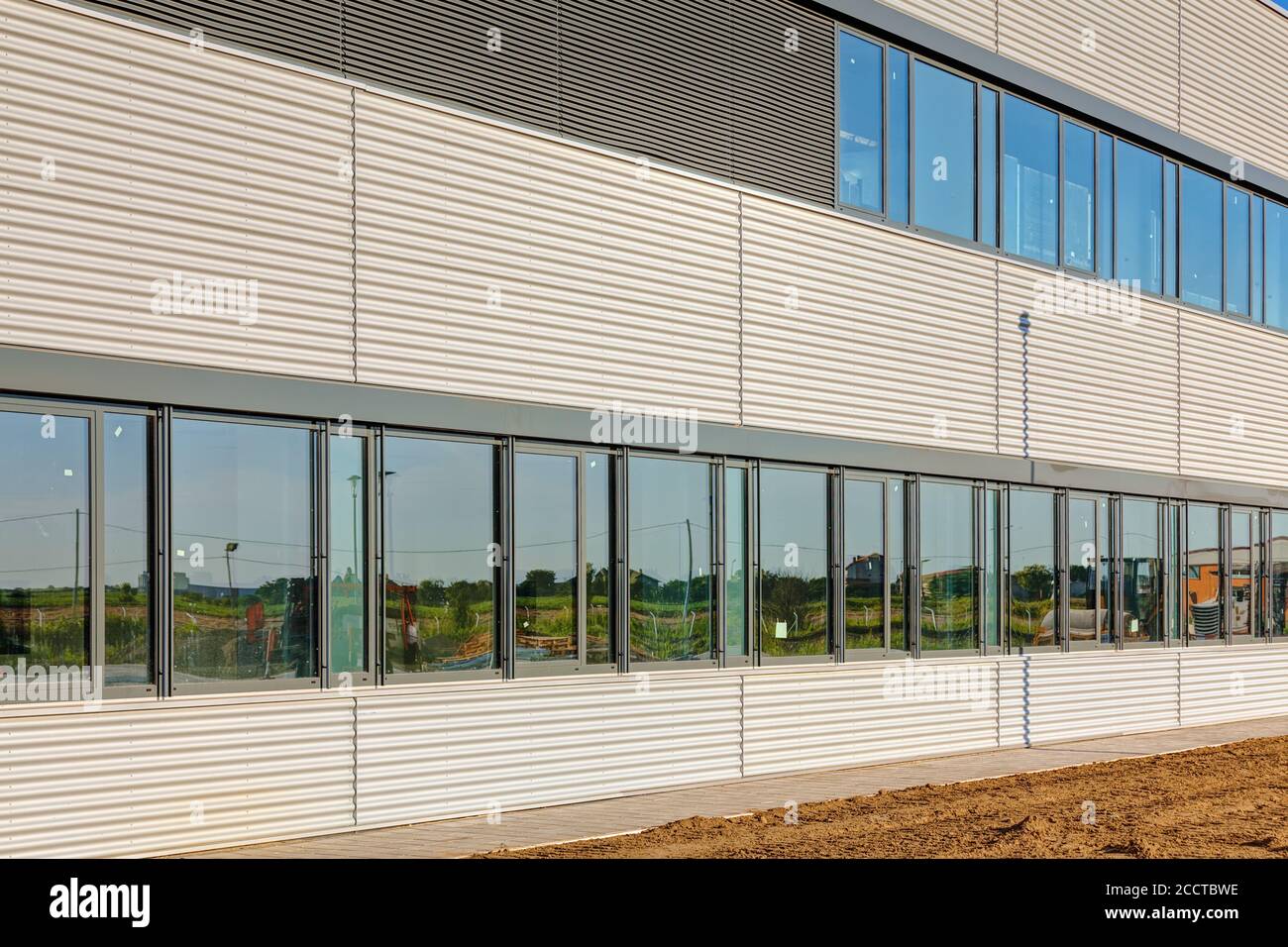 windows on the aluminum facade of the office building Stock Photo - Alamy