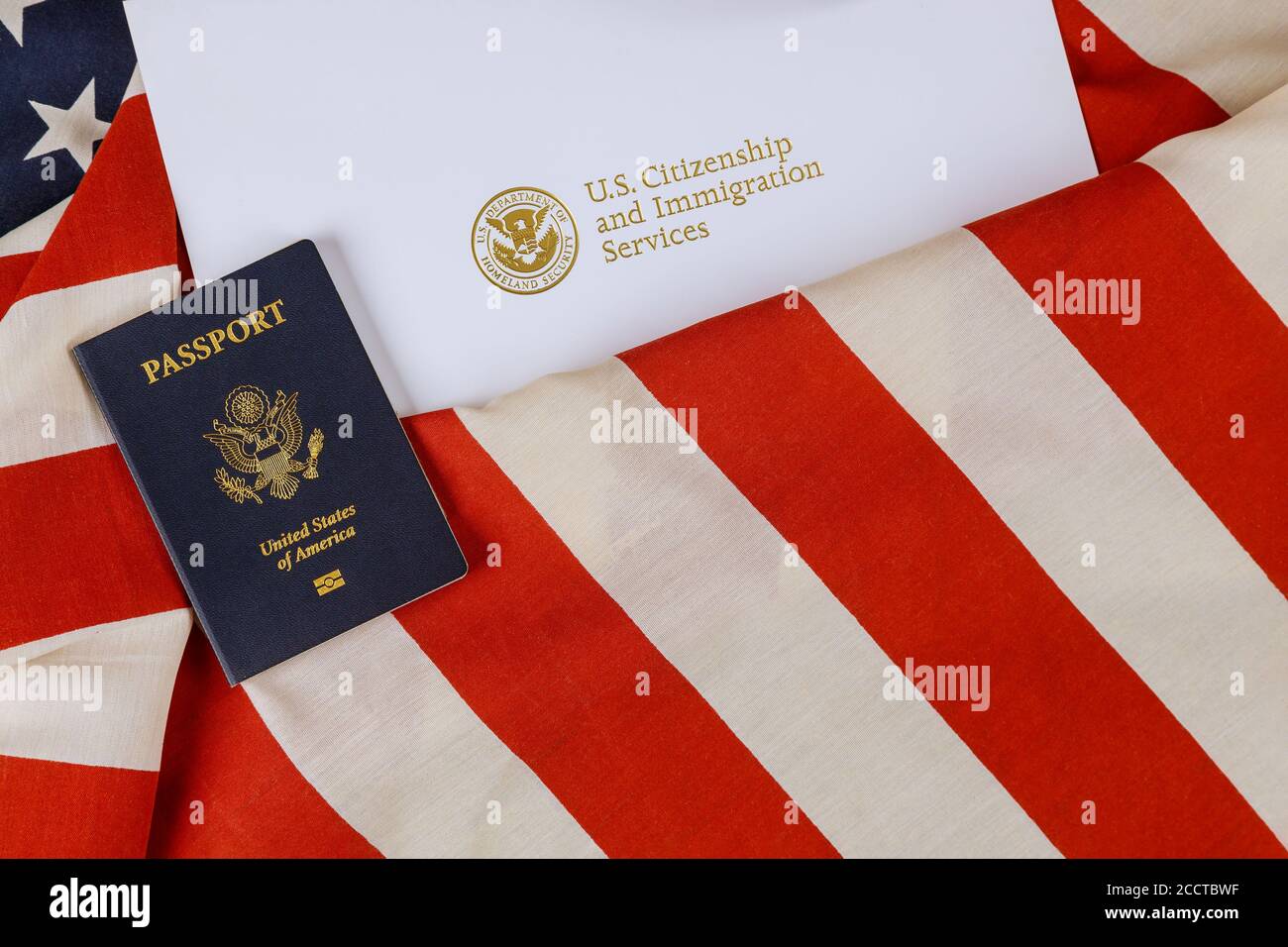 American flag next to Letter from U.S. Citizenship and Immigration ...