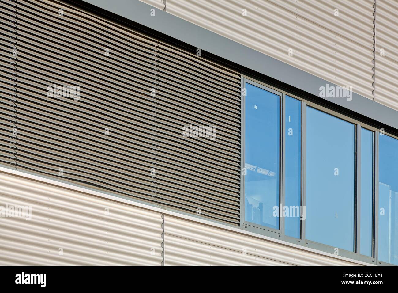 windows on the aluminum facade of the office building Stock Photo - Alamy