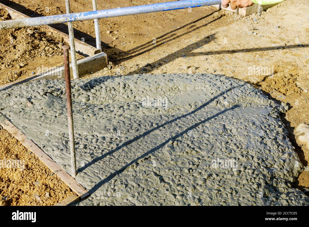 Process of installing construction of new sidewalks laying concrete ...