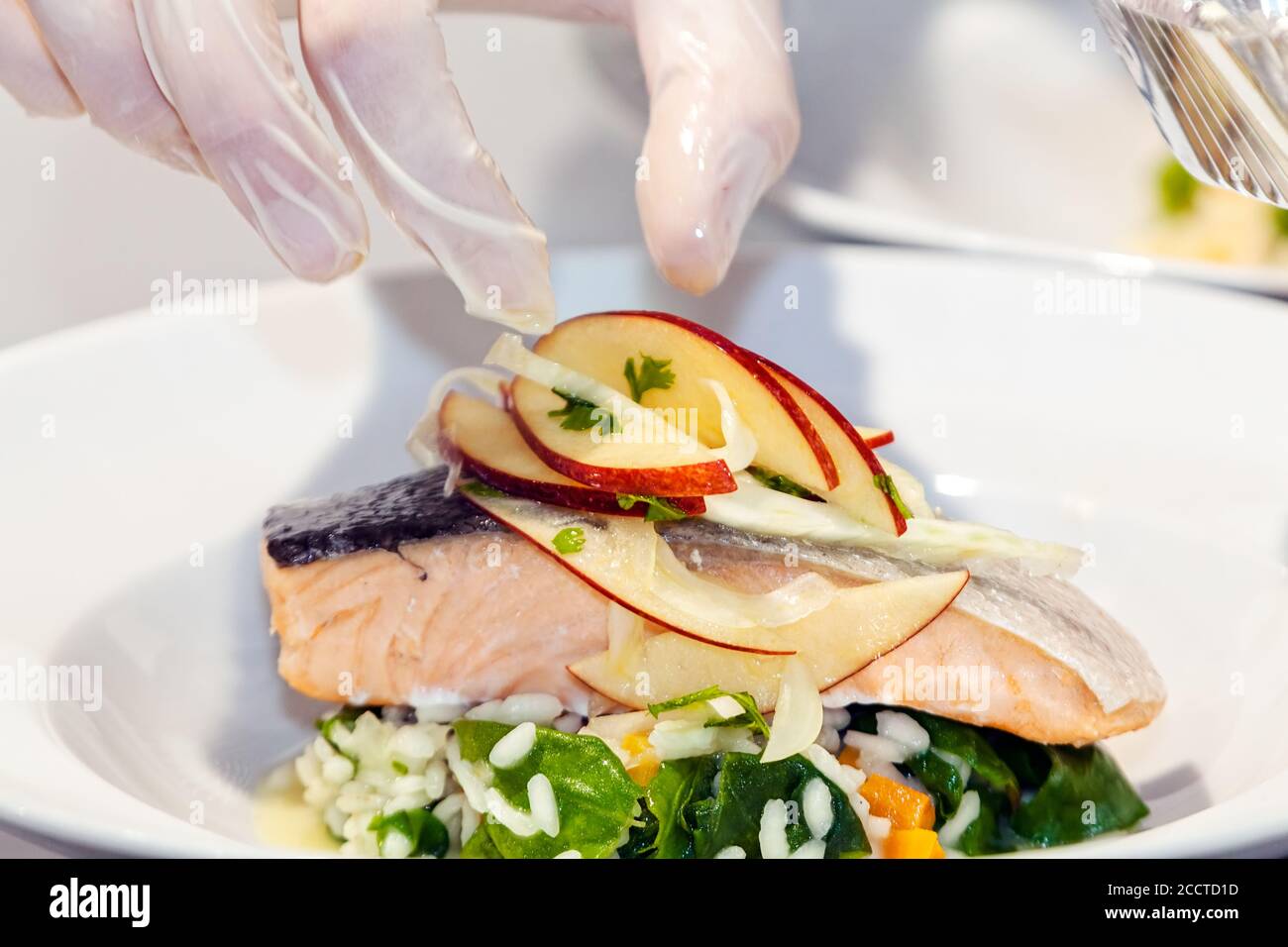 Decoration servings of salmon on rice Stock Photo - Alamy