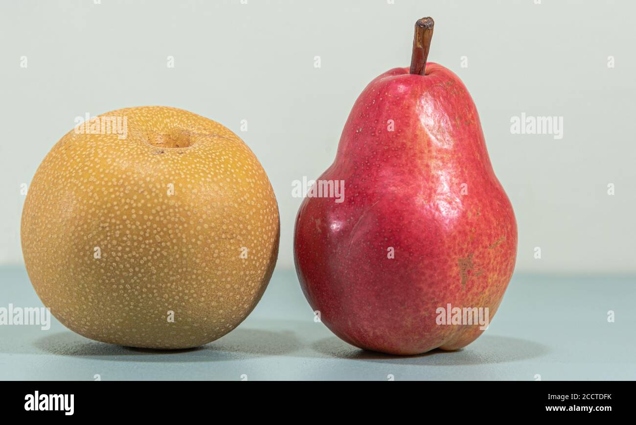 Fresh pear fruits. Asian (Pyrus pyrifolia) and Red (Pyrus communis ...