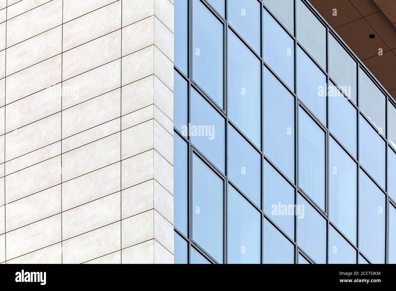 Modern office skyscraper with blue and green glass facade Stock Photo ...
