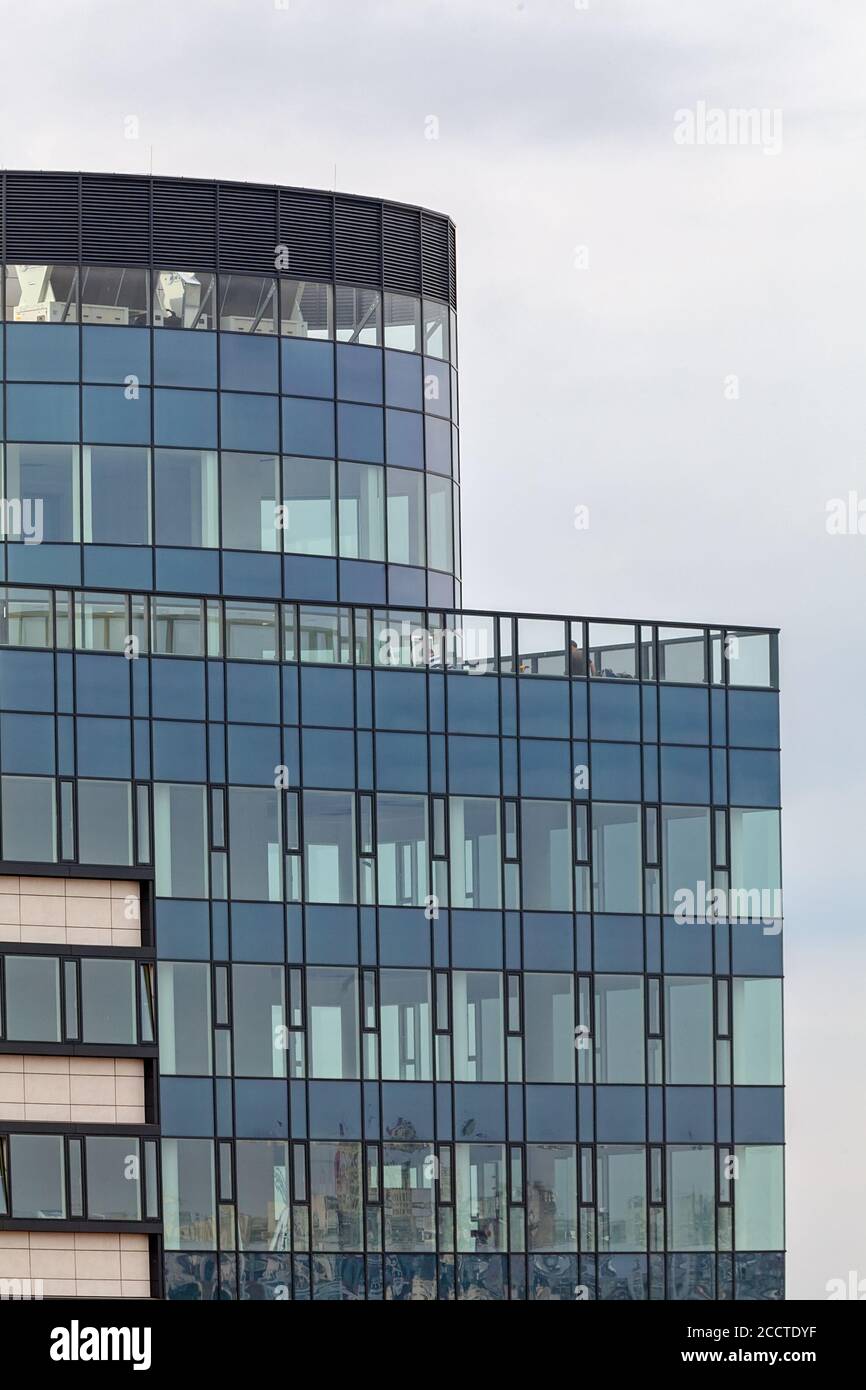Modern building detail with blue glass facade Stock Photo - Alamy