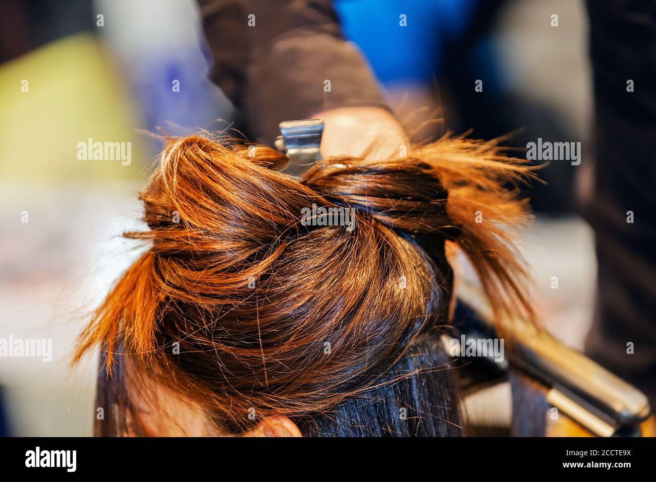 modern hairstyles with the help of electric Styler Stock Photo - Alamy