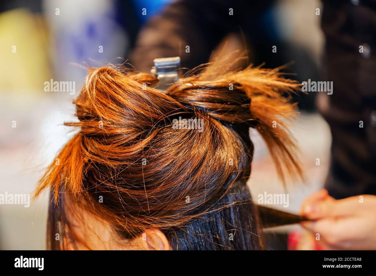 modern hairstyles with the help of electric Styler Stock Photo - Alamy