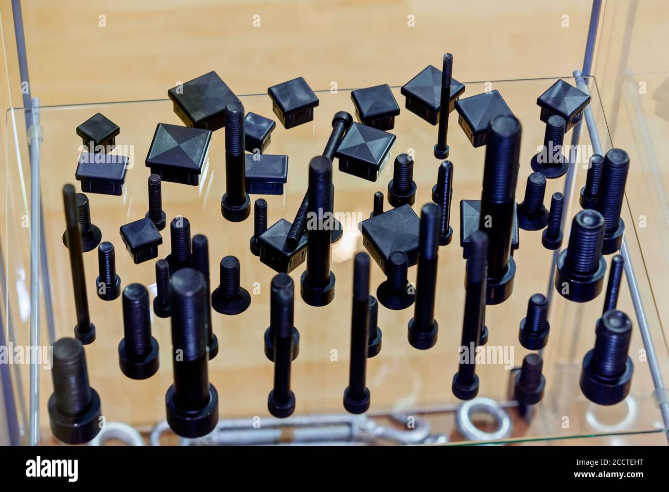 screws, nuts, clamps ...on the glass Stock Photo - Alamy