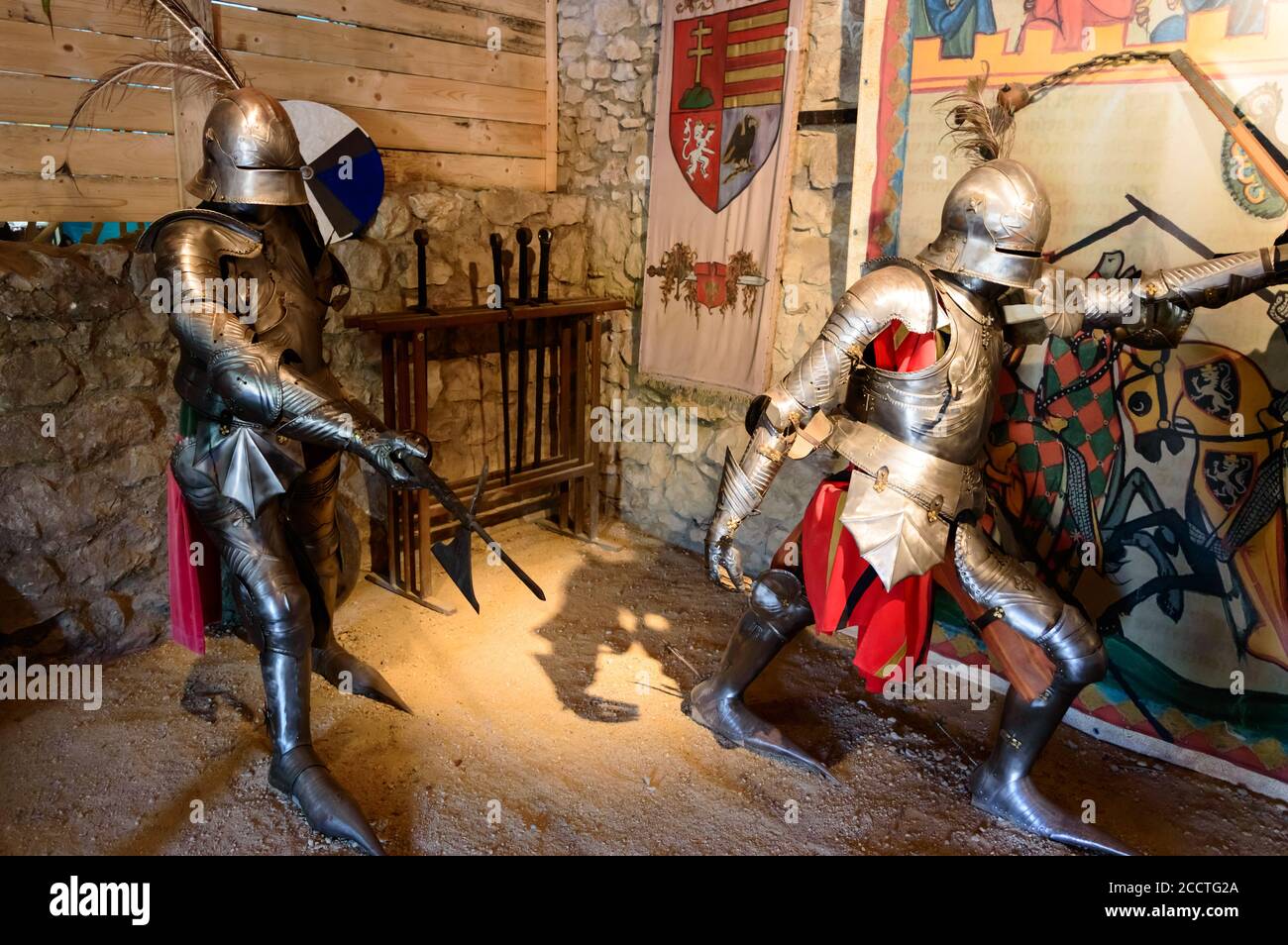 Medieval knights in full armor attack. Middle ages weapon Stock Photo ...