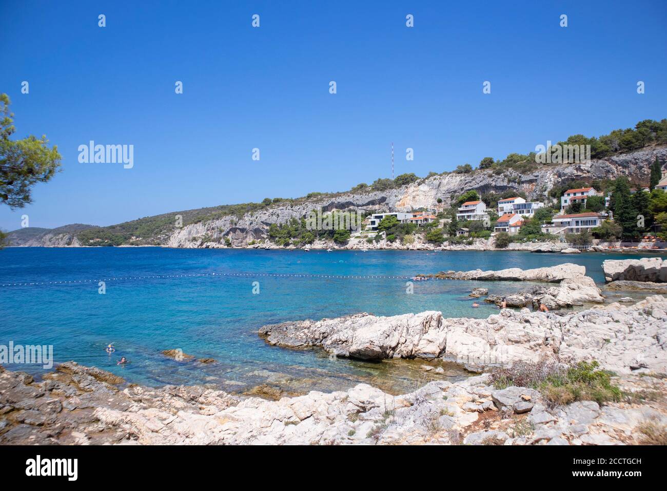 Beautiful rocky beach and steep cliffs at Hvar island, Croatia ...