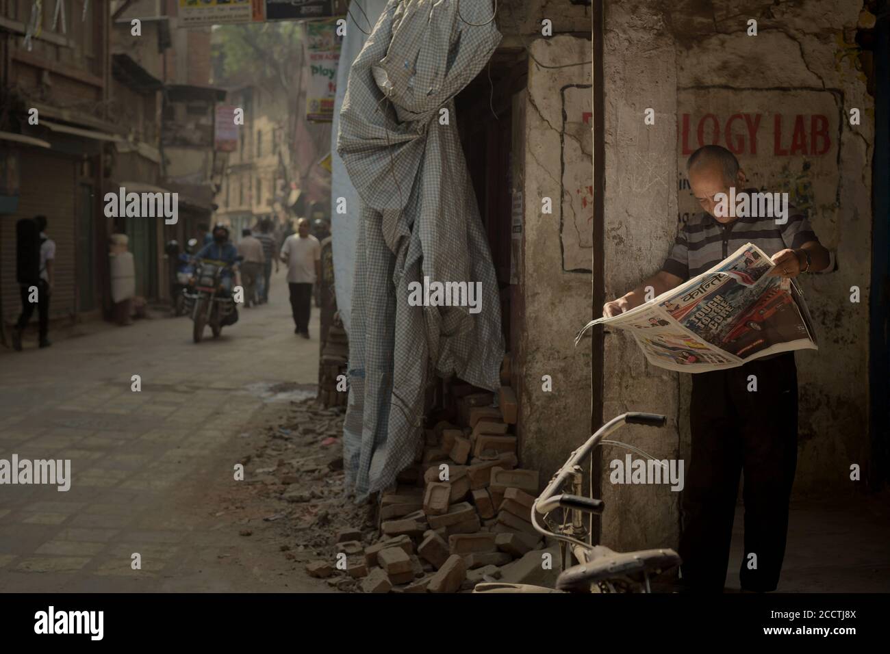 Nepal newspaper news reading hi-res stock photography and images - Alamy