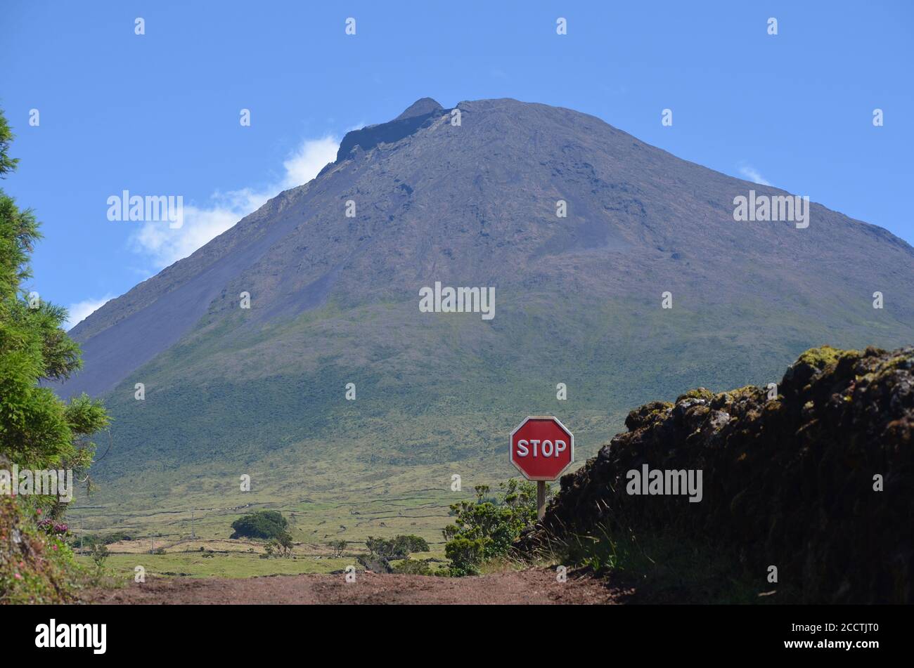 The conical Pico volcano looming over its namesake island (Azores ...