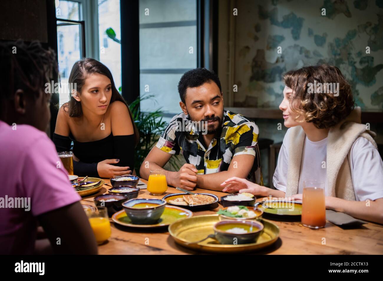 Highschool students having a lunch in a modern cafe Stock Photo - Alamy