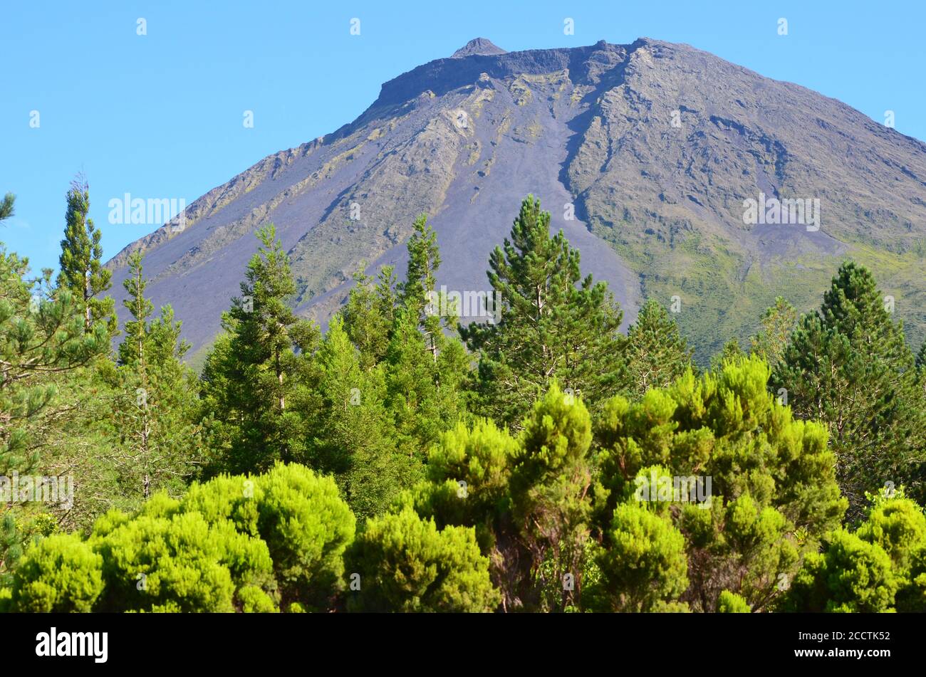 The conical Pico volcano looming over its namesake island (Azores ...