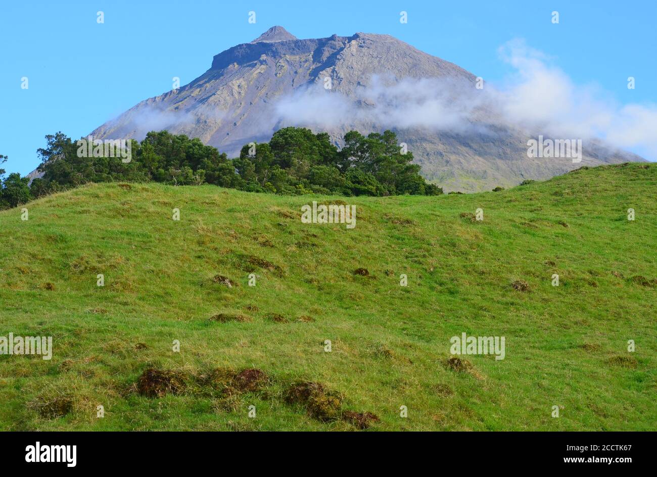 The conical Pico volcano looming over its namesake island (Azores ...