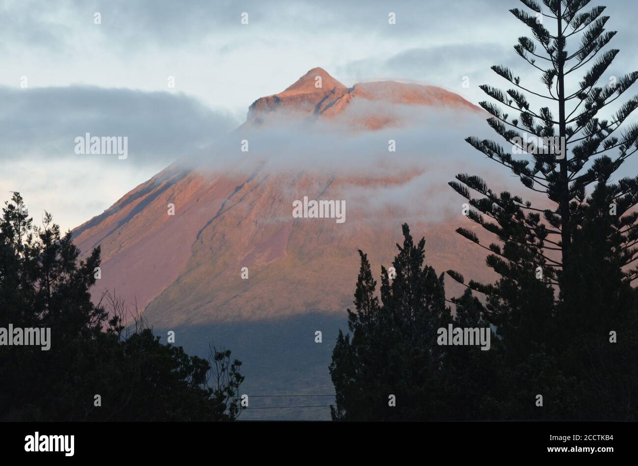 The conical Pico volcano looming over its namesake island (Azores ...