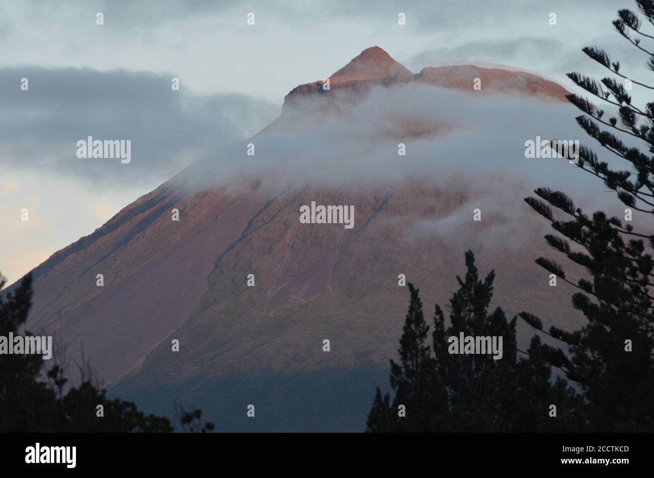 The conical Pico volcano looming over its namesake island (Azores ...