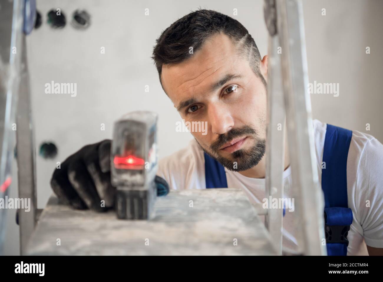 Person using precision instrument hi-res stock photography and images ...