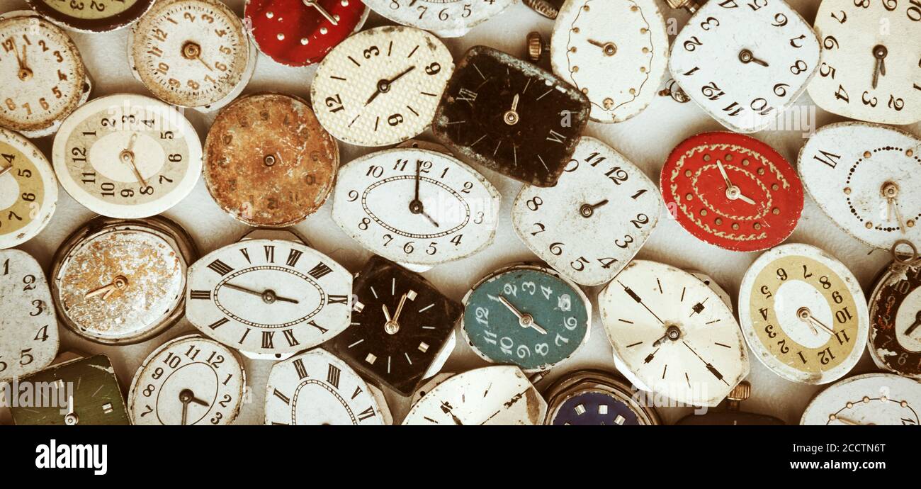 Old fashioned retro little wrist watch rusty dials with hands top view ...