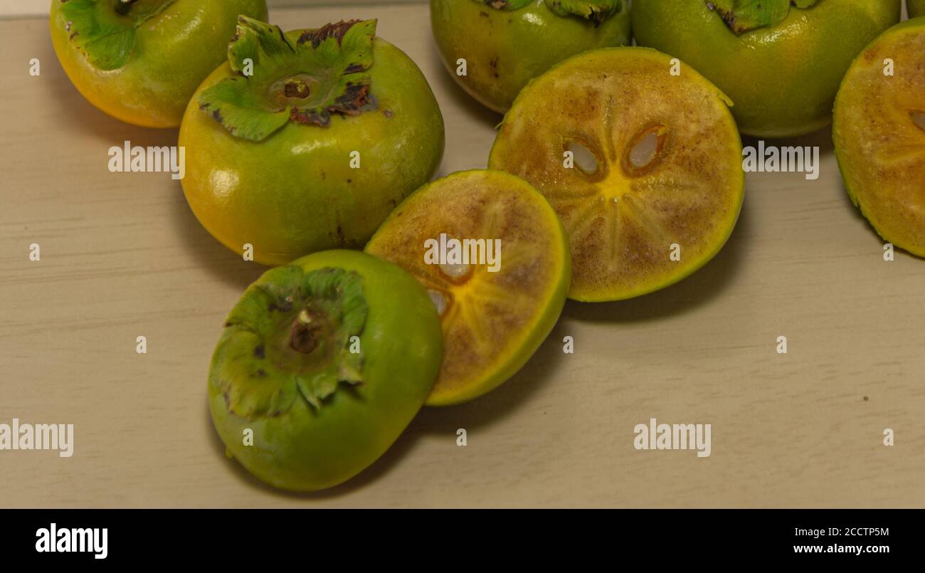 Persimmon-chocolate fruits. Fresh fruits. Natural food. Fruit with ...