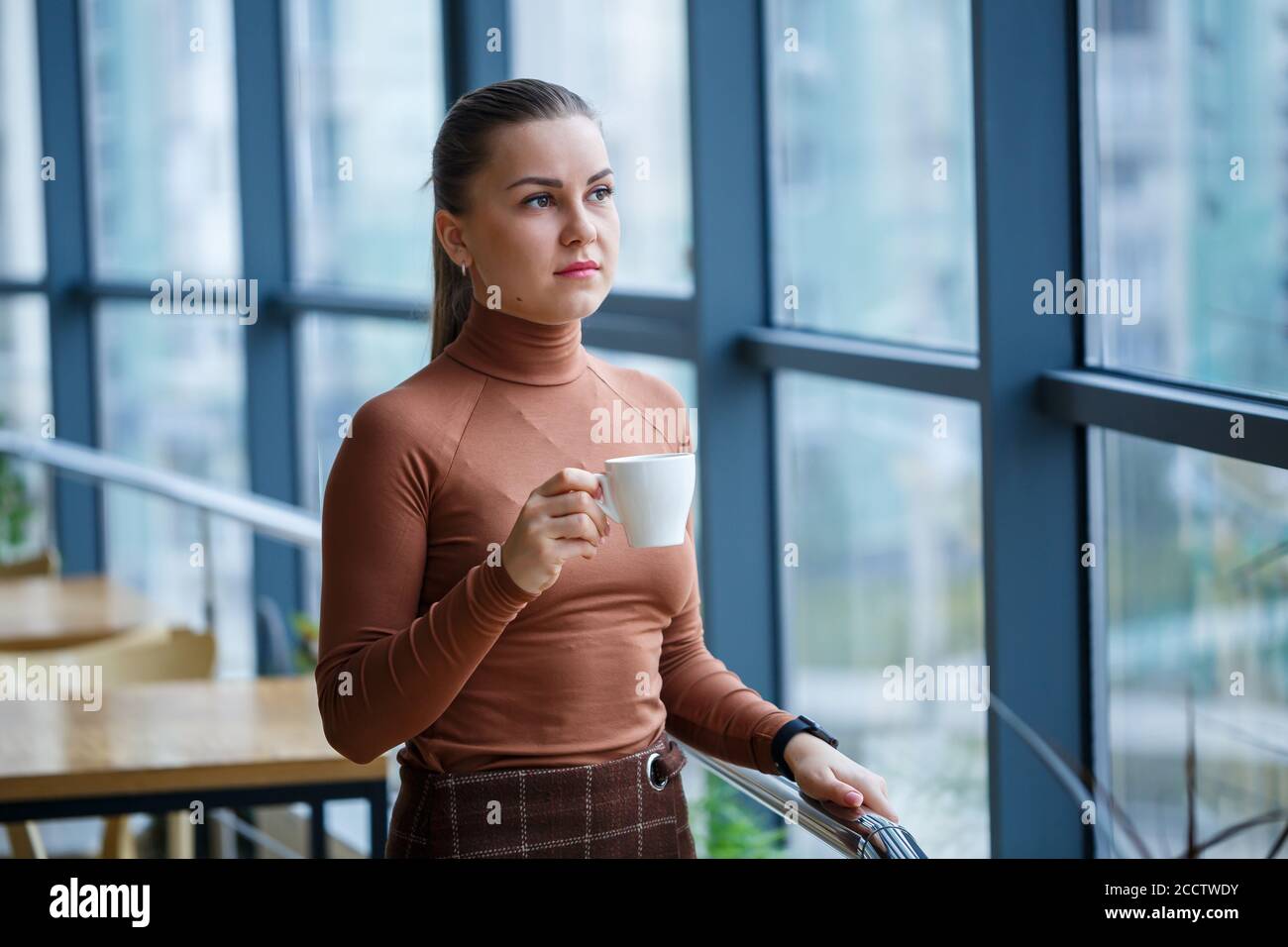 Smiling happy managing woman director thinking about her successful ...