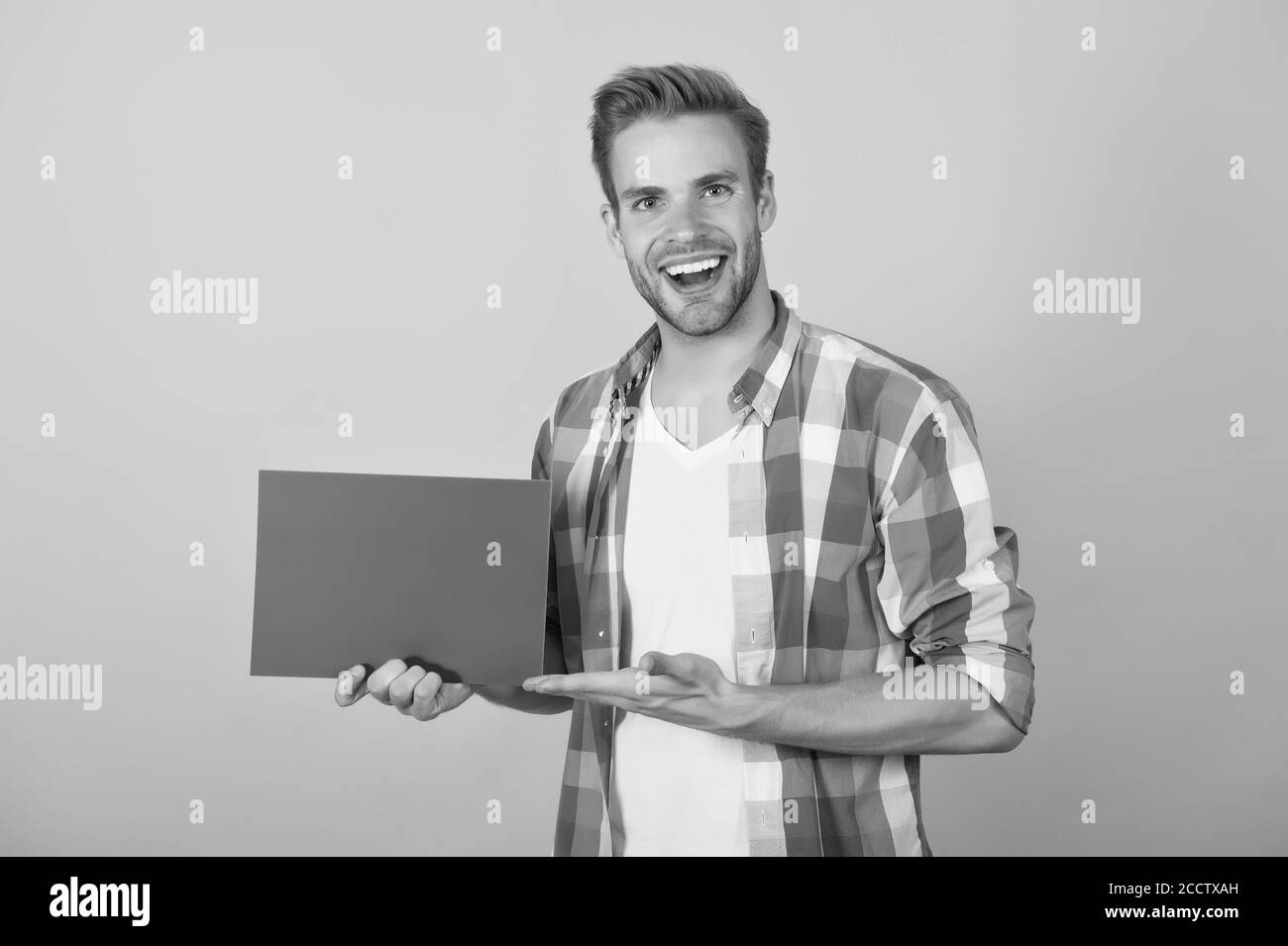 You need this product. Happy guy hold pink sheet and open hand ...