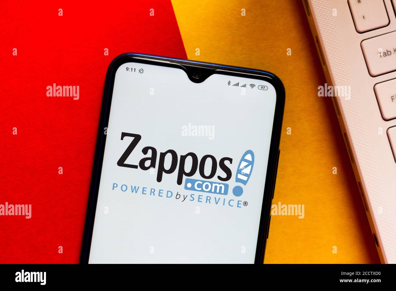 In this photo illustration the Zappos.com logo seen displayed on a ...