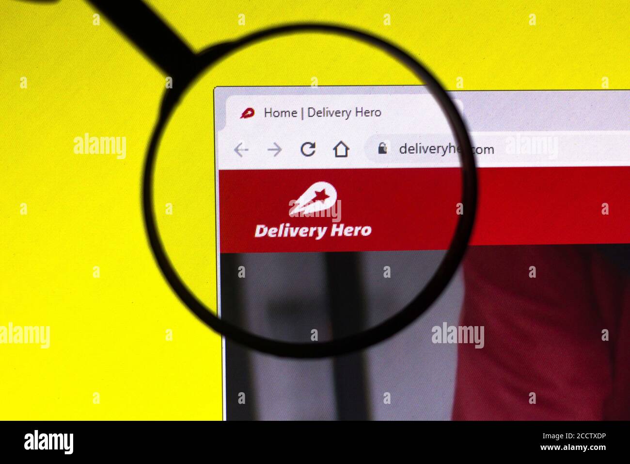 In this photo illustration the Delivery Hero logo is seen through a ...