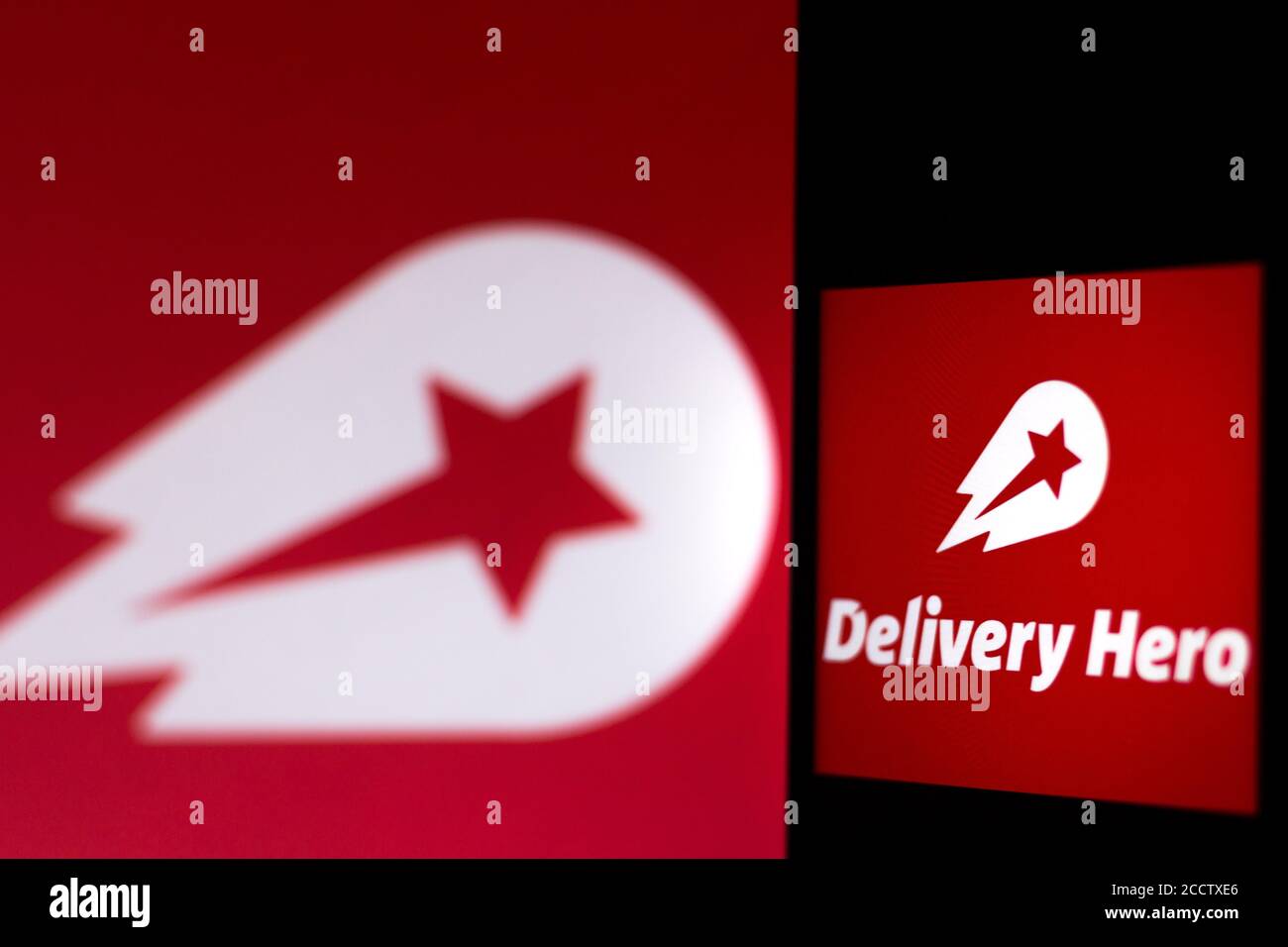 In this photo illustration the Delivery Hero logo seen displayed on a ...