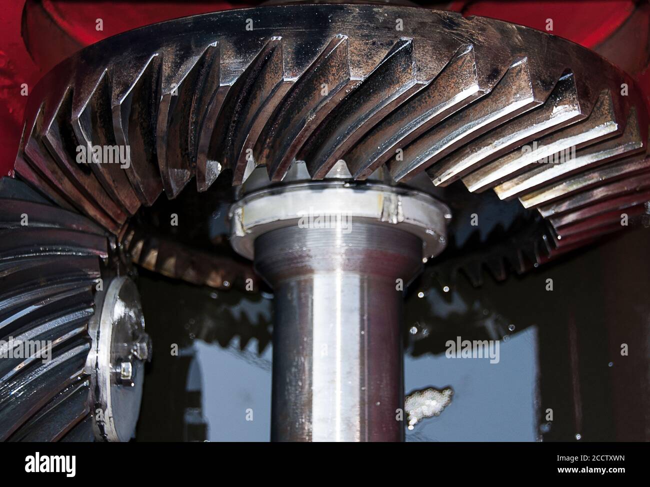 Two steel shaft with gears are connected to each other at an angle ...