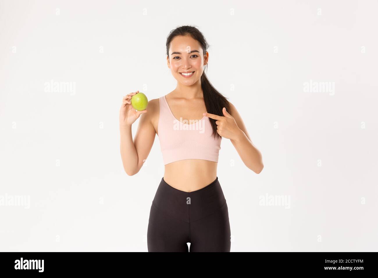 Sport, wellbeing and active lifestyle concept. Portrait of smiling slim ...