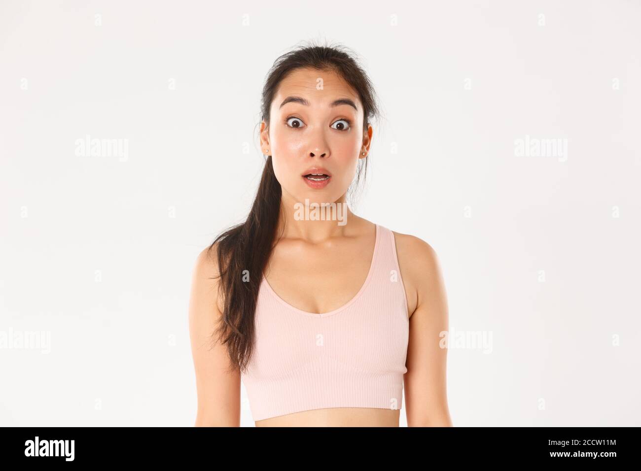 Sport, wellbeing and active lifestyle concept. Close-up of surprised ...